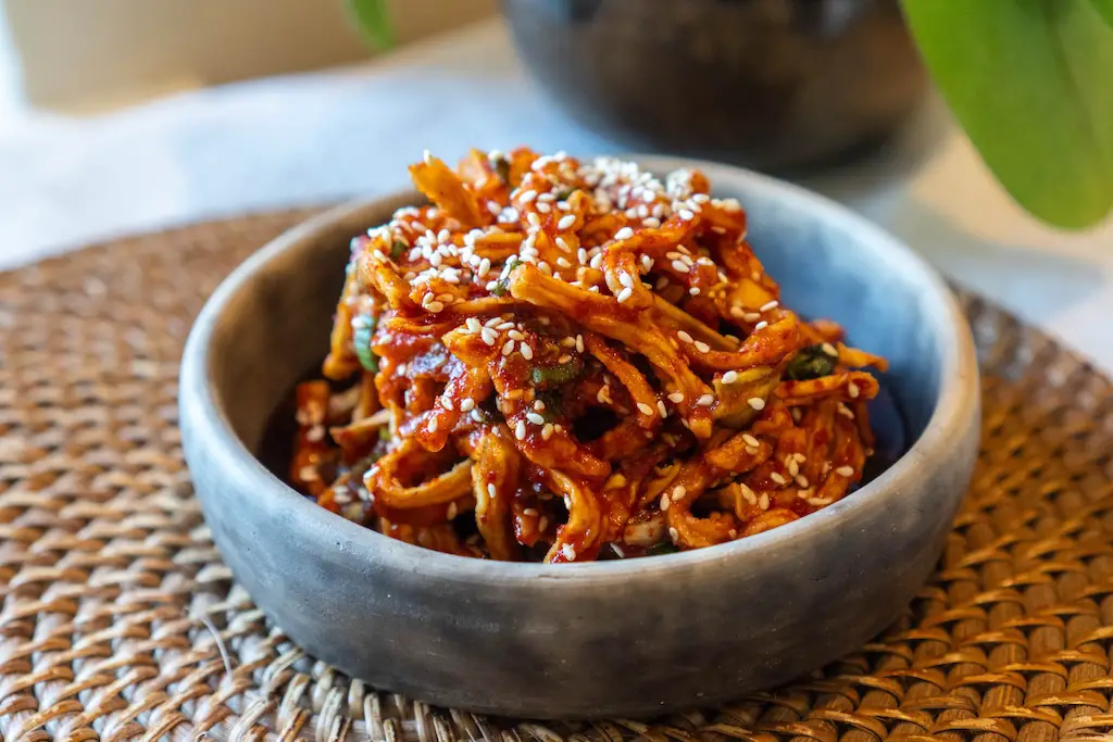 Spicy Dried Radish Salad Recipe (Mumallaengi Muchim) - Carving A Journey